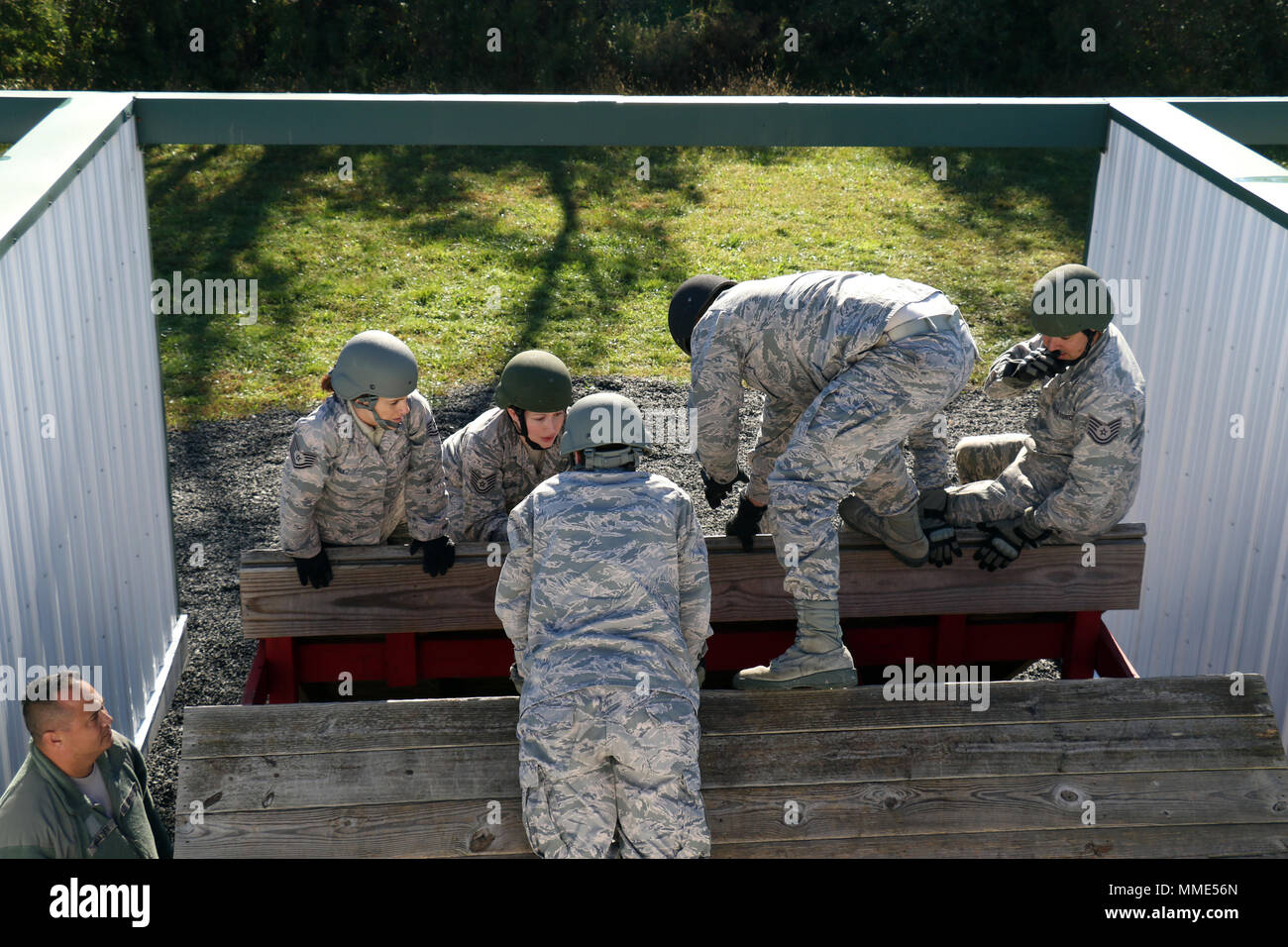 Production Recruiter and Retention Airmen navigate obstacles on a ...