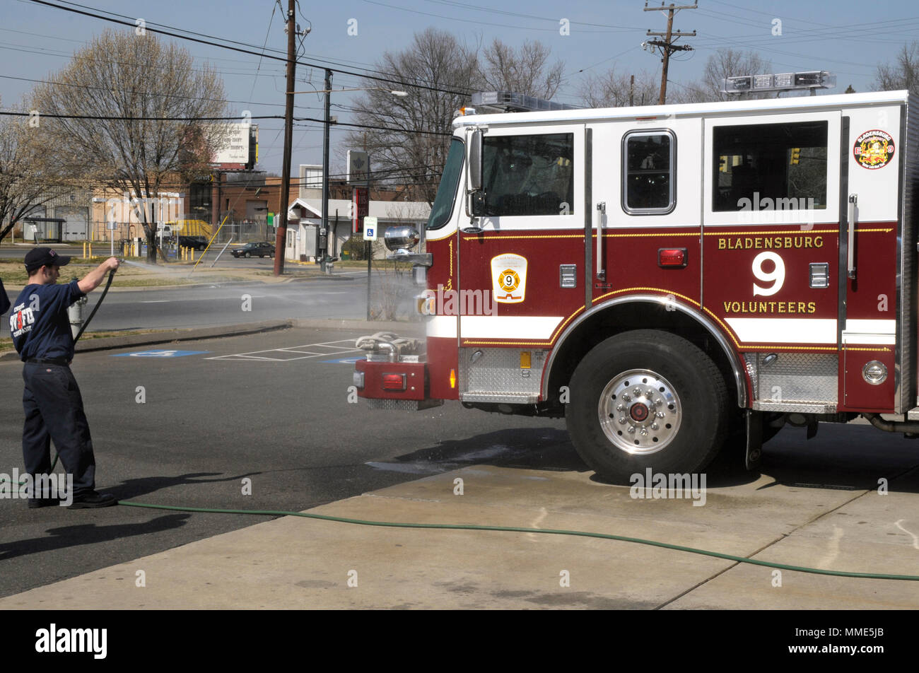 Firefighter washing hi-res stock photography and images - Alamy