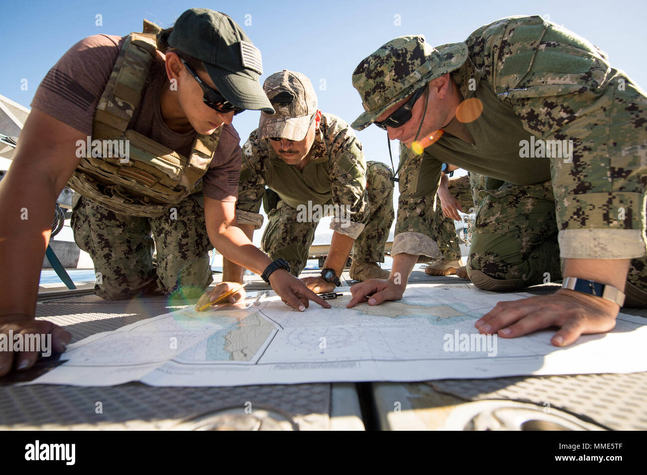 Sailors assigned to Explosive Ordnance Disposal Mobile Unit One train ...