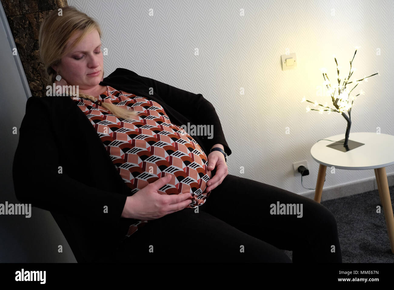Woman giving birth alone hi-res stock photography and images - Alamy