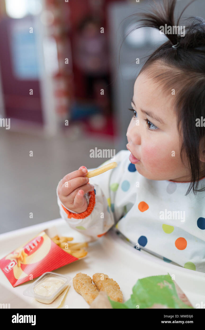 Children eat fries hi-res stock photography and images - Alamy