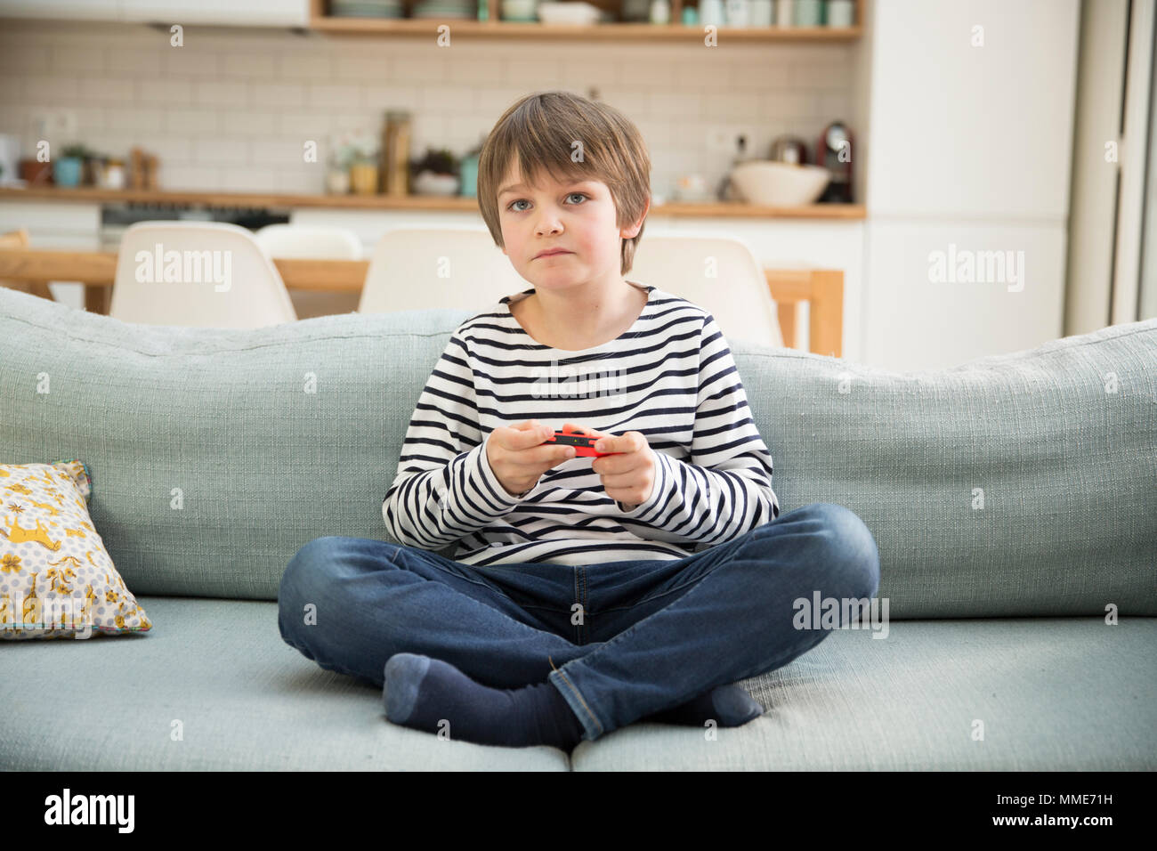Child playing nintendo switch hi-res stock photography and images - Alamy
