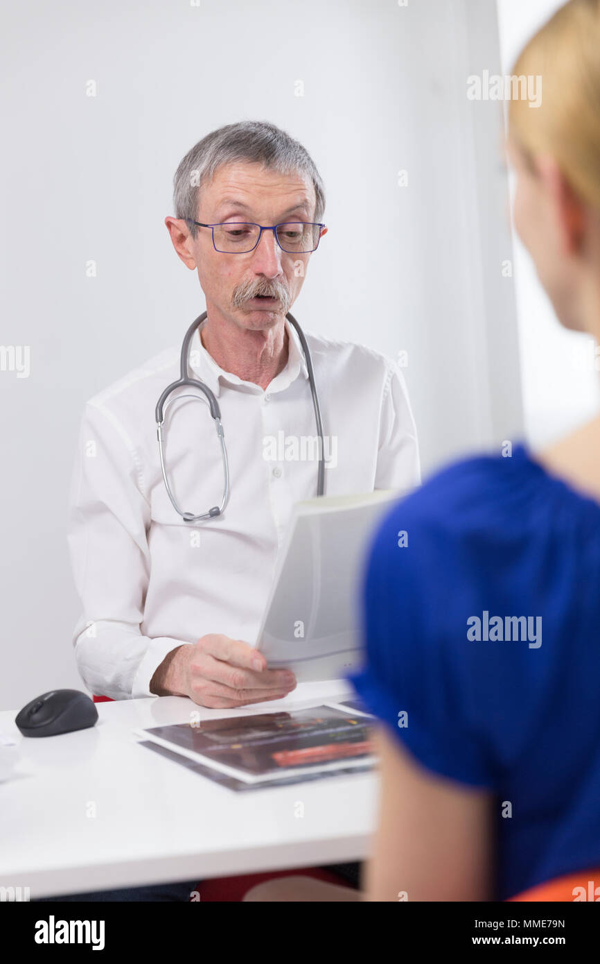 Woman mature doctor consultation hi-res stock photography and images ...