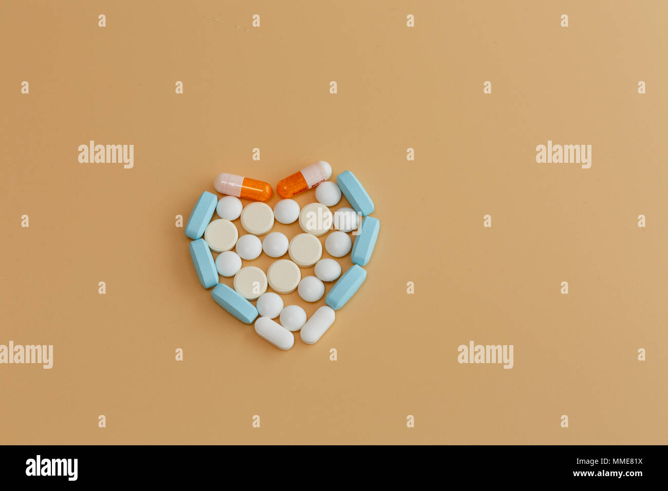 Heart - shaped patterns composed of various tablets Stock Photo - Alamy