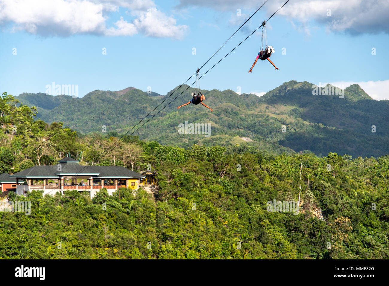 Tourists on the Zip Line at Bohol Island, Philippines Stock Photo - Alamy