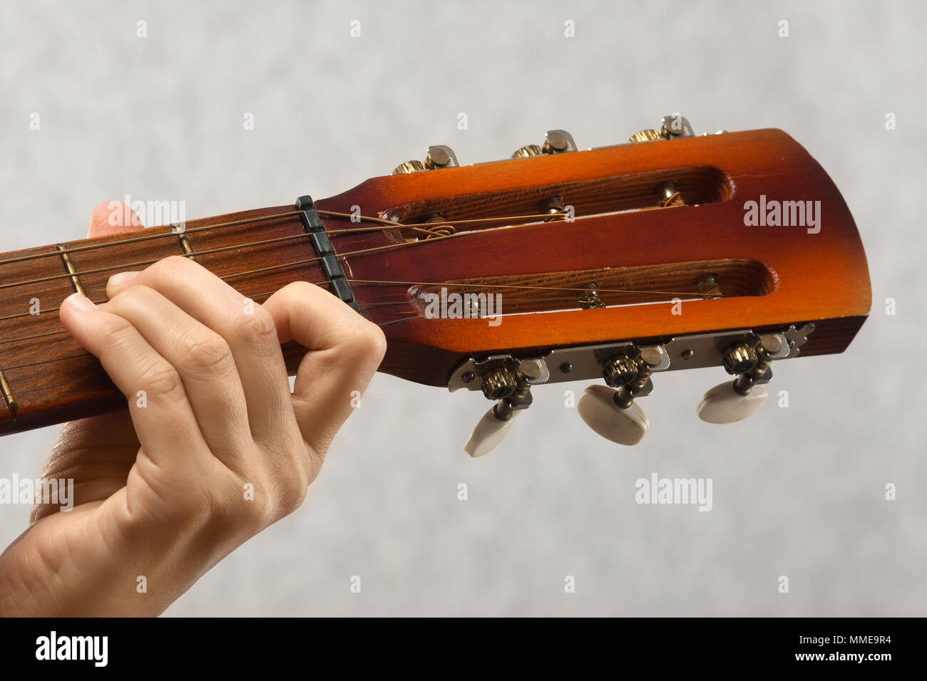 closeup of guitarist hand playing acoustic guitar Stock Photo - Alamy
