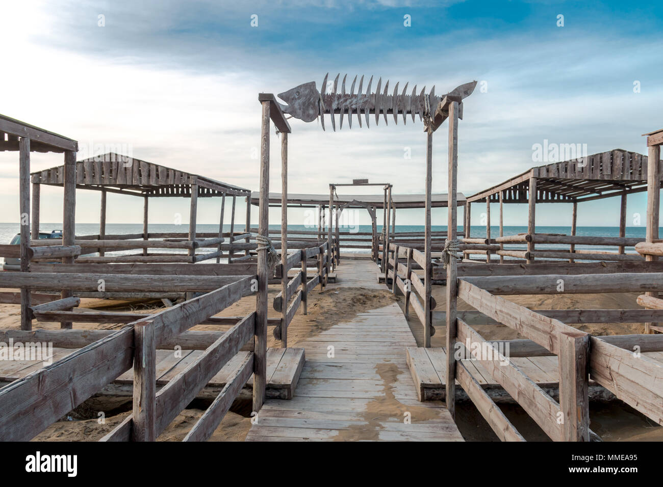 Wooden bridge leading to seaside Stock Photo - Alamy