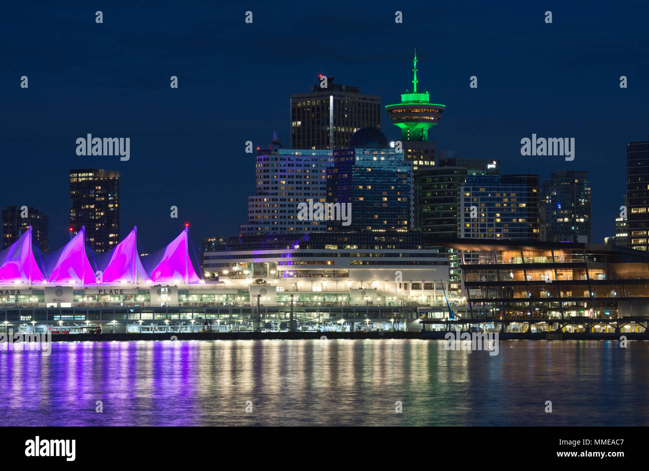 Vancouver skyline waterfront at night. Canada Place, Harbour Centre ...