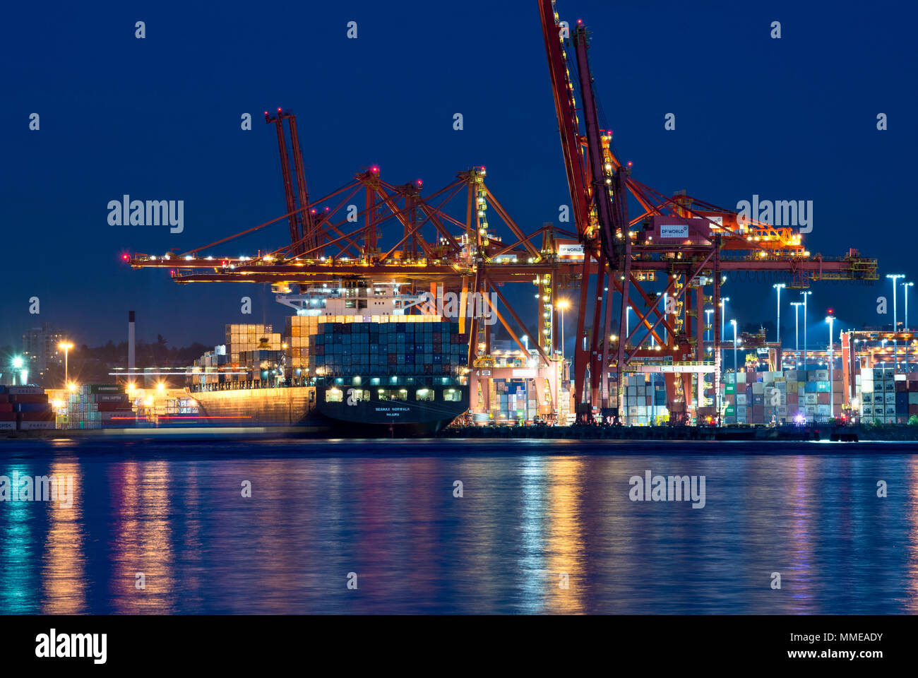Vancouver container shipping terminal with loading cranes and container ...