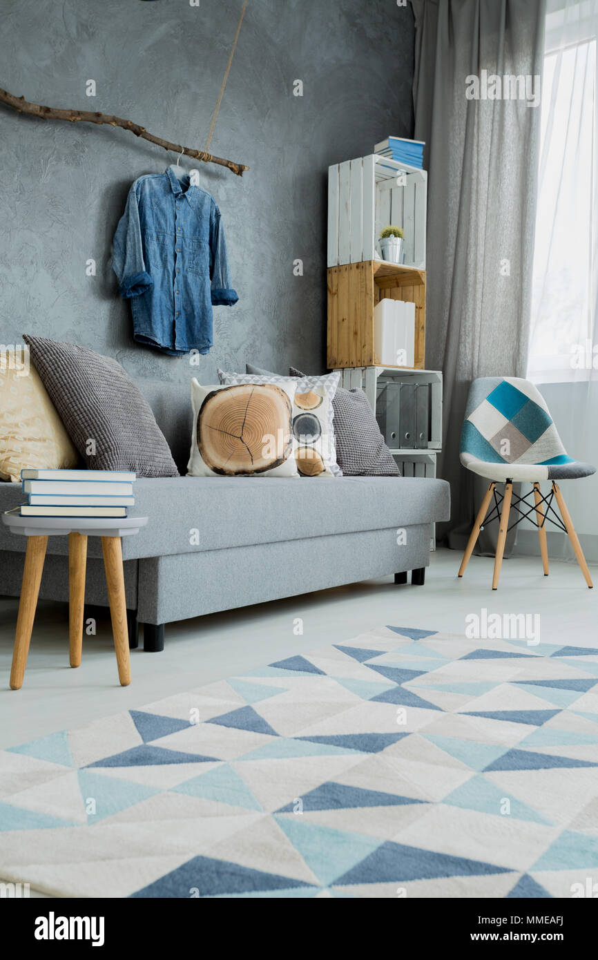 Modern minimalistic and bright living room in shades of cyan with sofa ...
