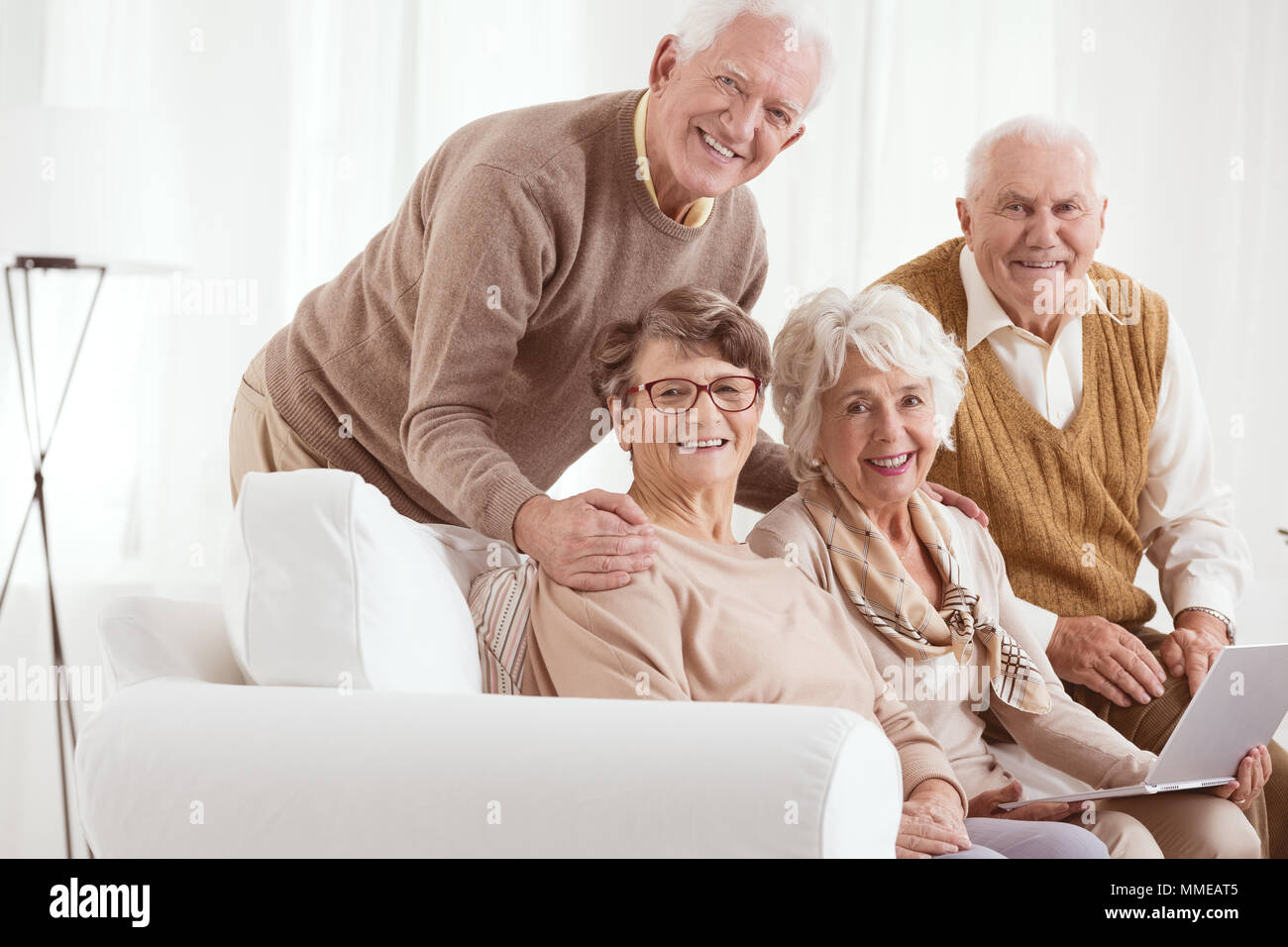 Smiling elderly pensioners computer hi-res stock photography and images ...