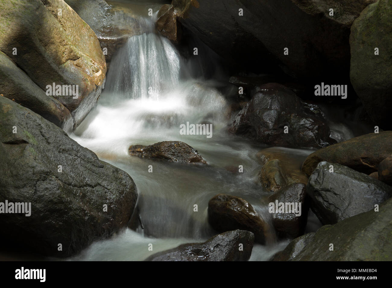 small waterfall over rocks Stock Photo - Alamy