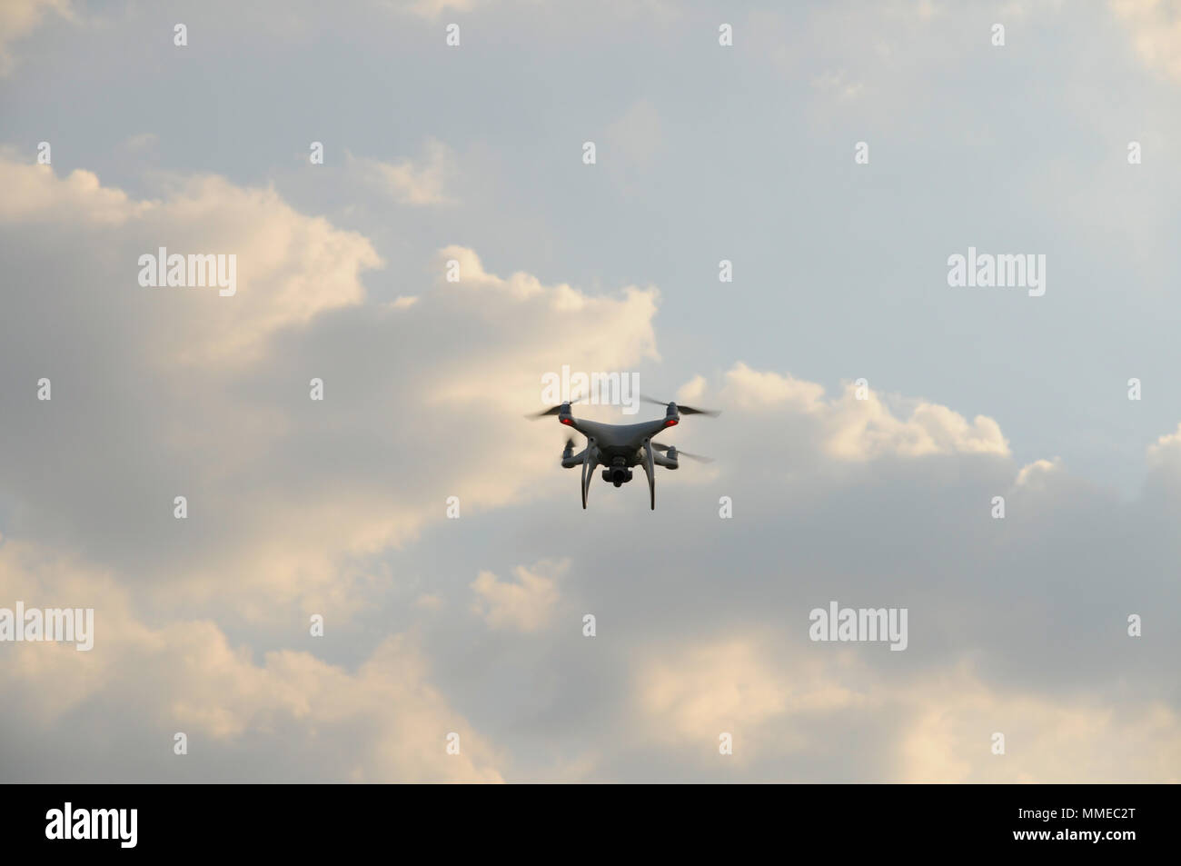Drone in the sky filming with copy space Stock Photo - Alamy