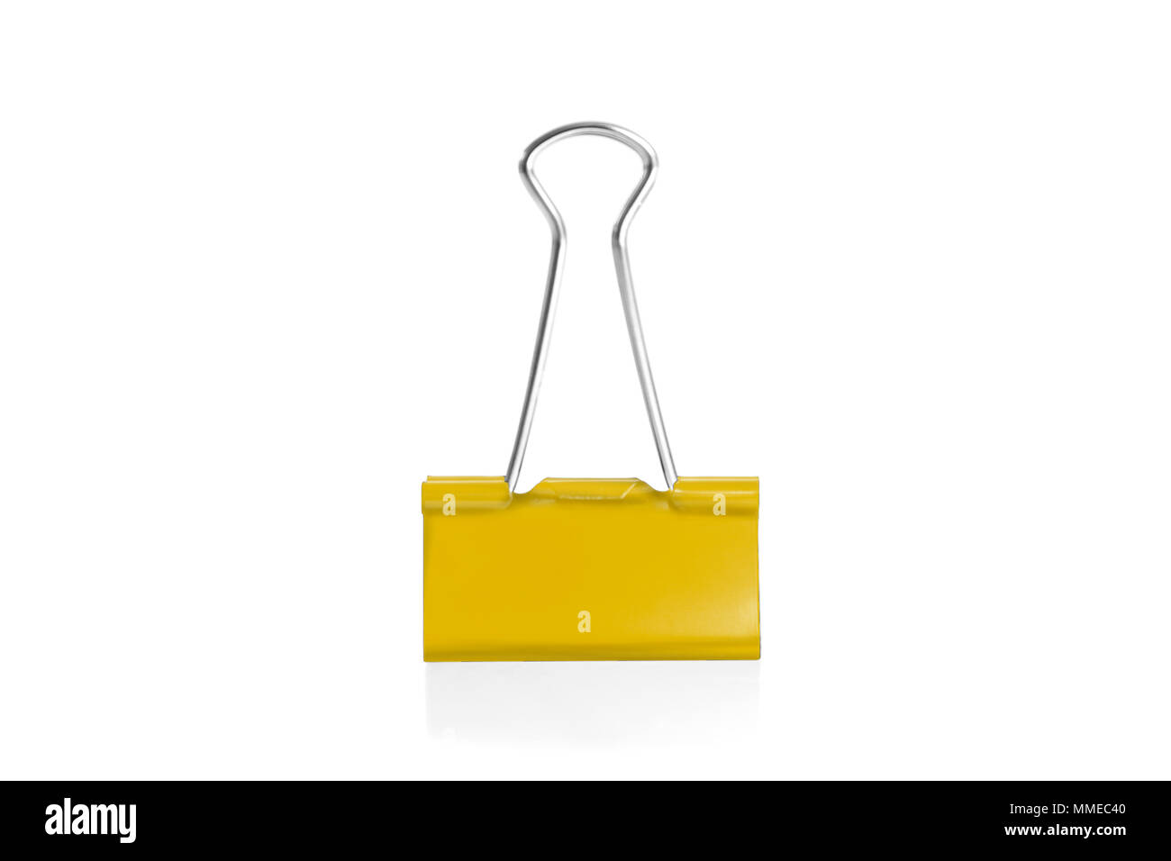 Paper clip isolated from white background. A paperclip is a device for ...