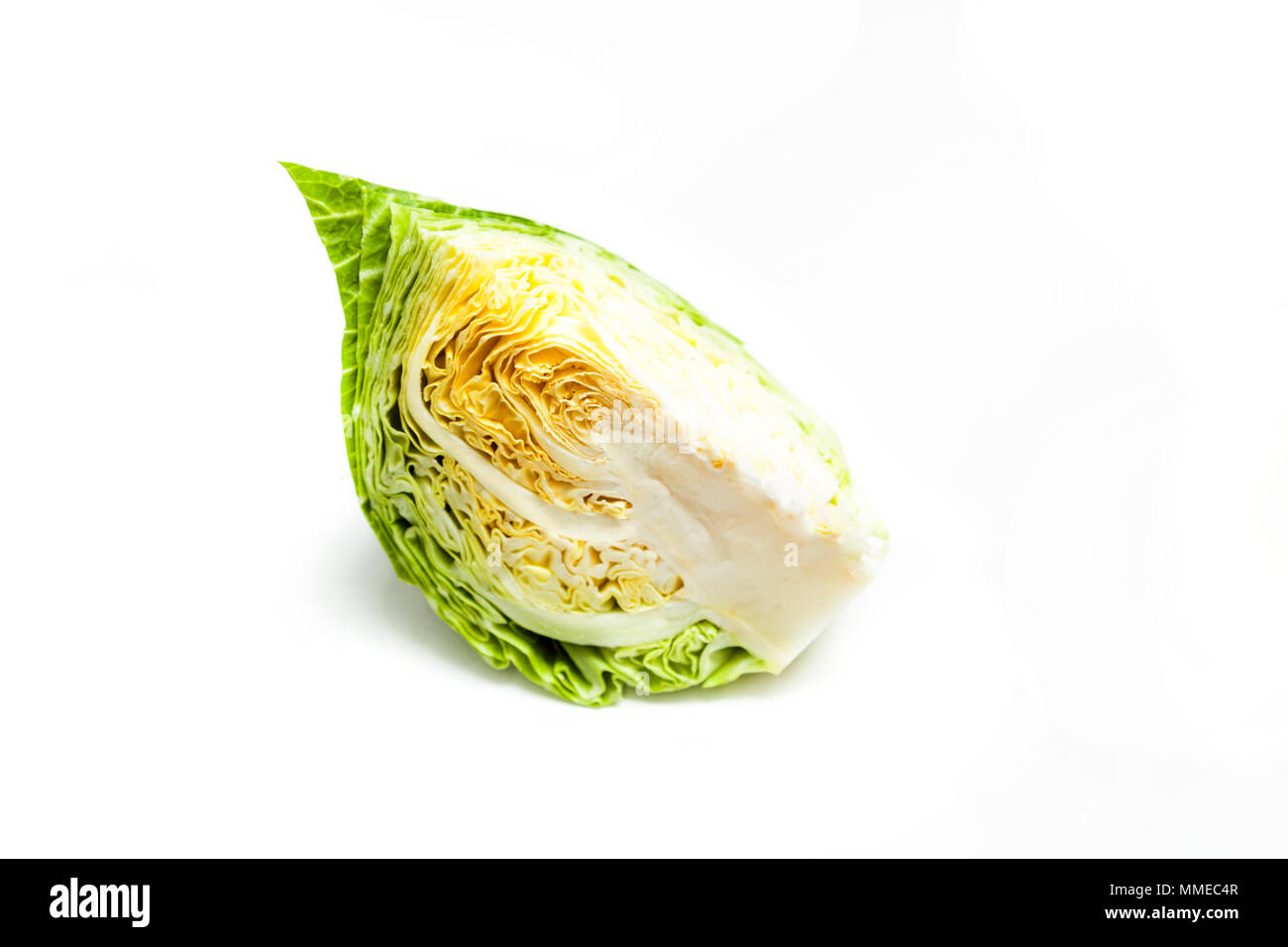 Cabbage a quarter cut piece. Isolated on white background Stock Photo ...