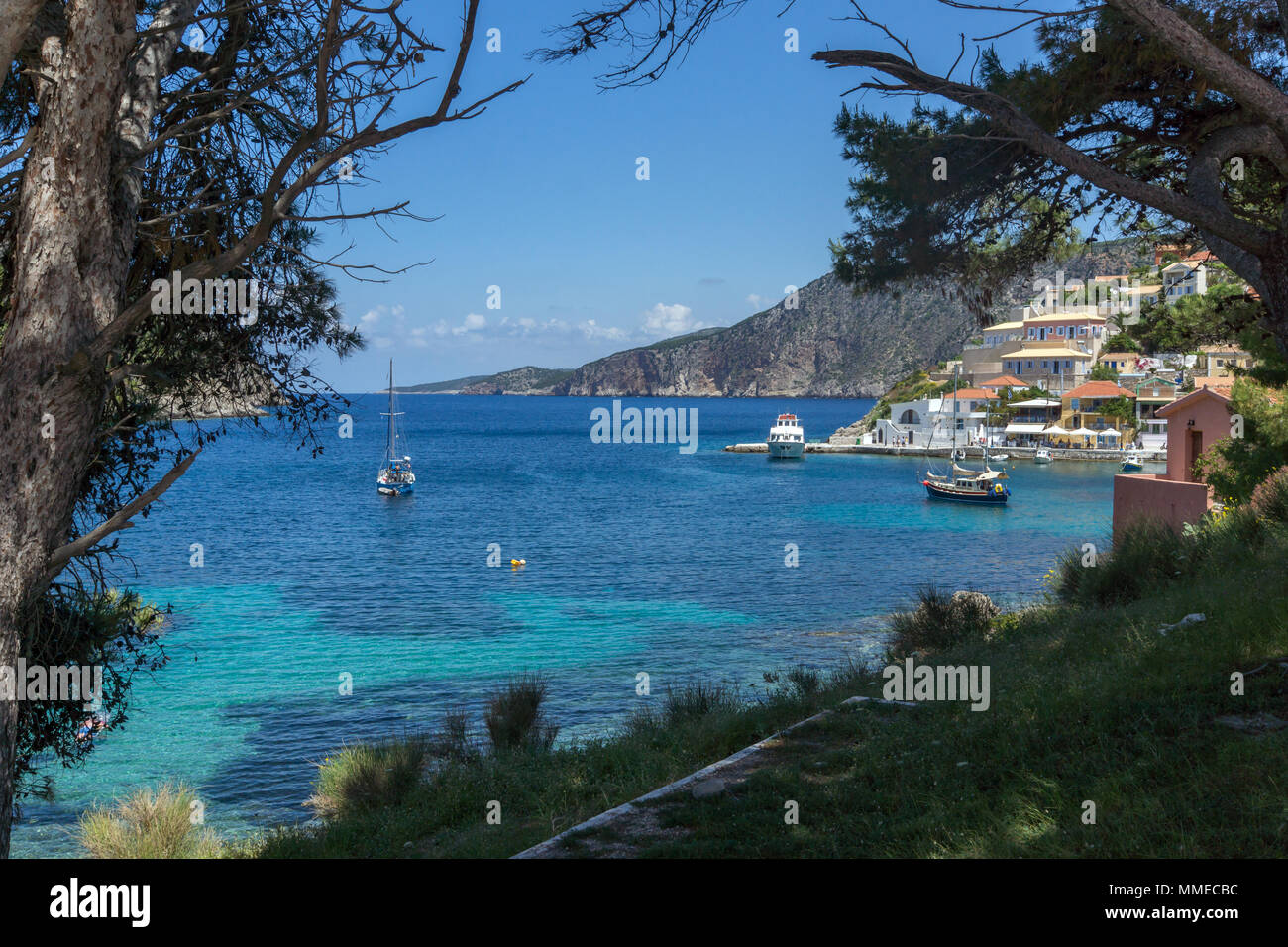 Beach of Assos village and beautiful sea bay, Kefalonia, Ionian islands ...