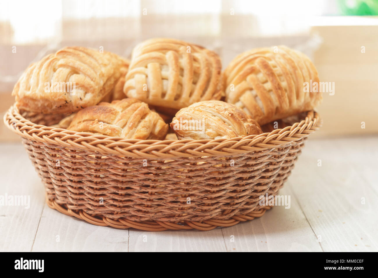 Cookies and sweet pastries with cross wired lines in basket Stock Photo ...