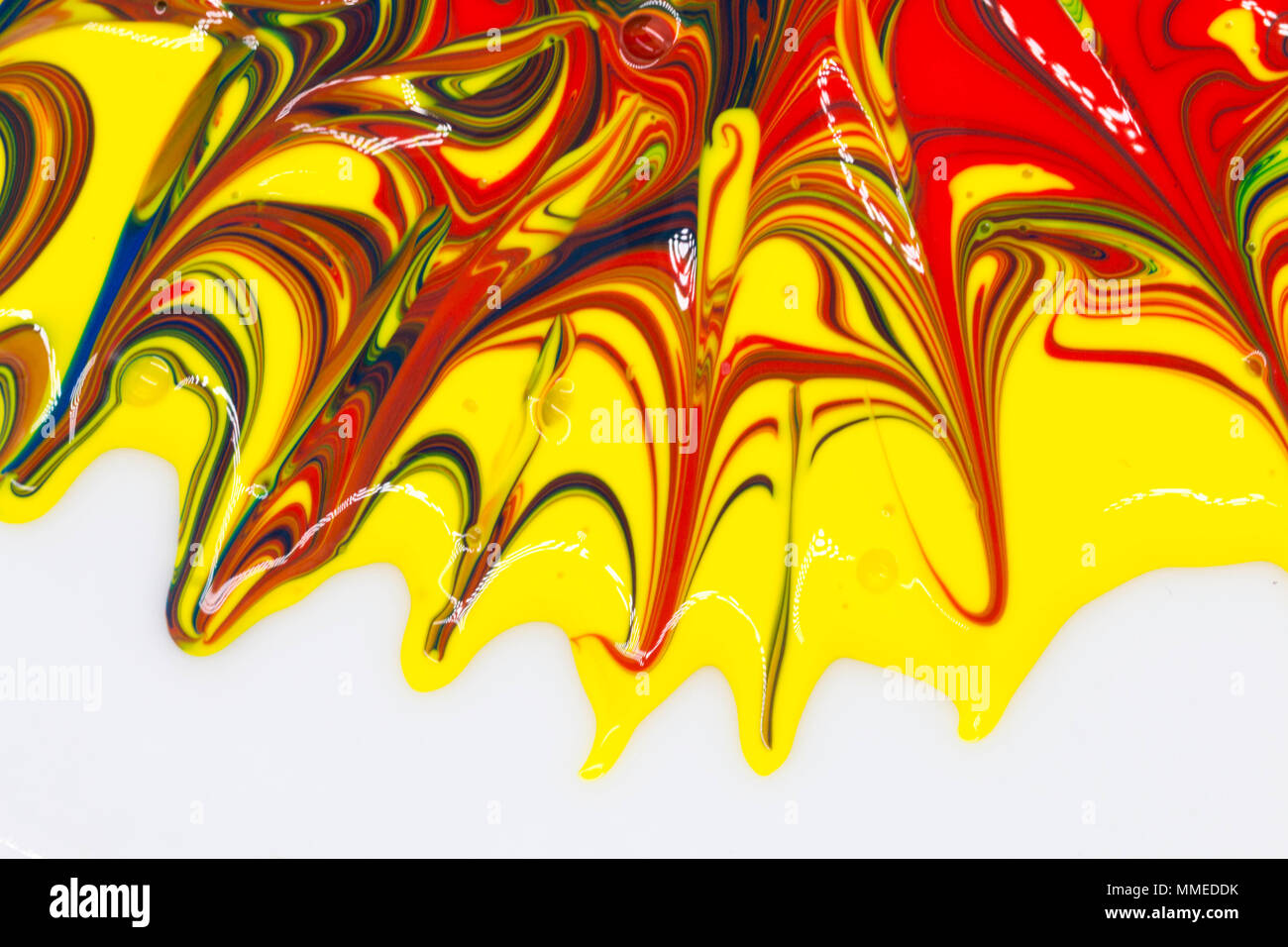 Abstract background of red yellow and blue paint splat / swirl Stock ...