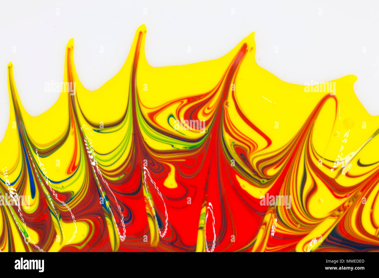 Abstract background of red yellow and blue paint splat / swirl Stock ...