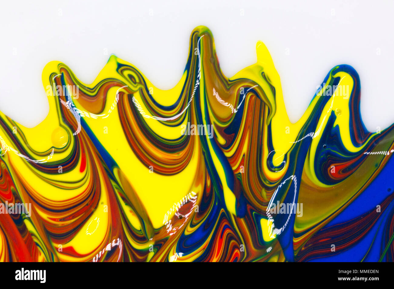 Abstract background of red yellow and blue paint splat / swirl Stock ...