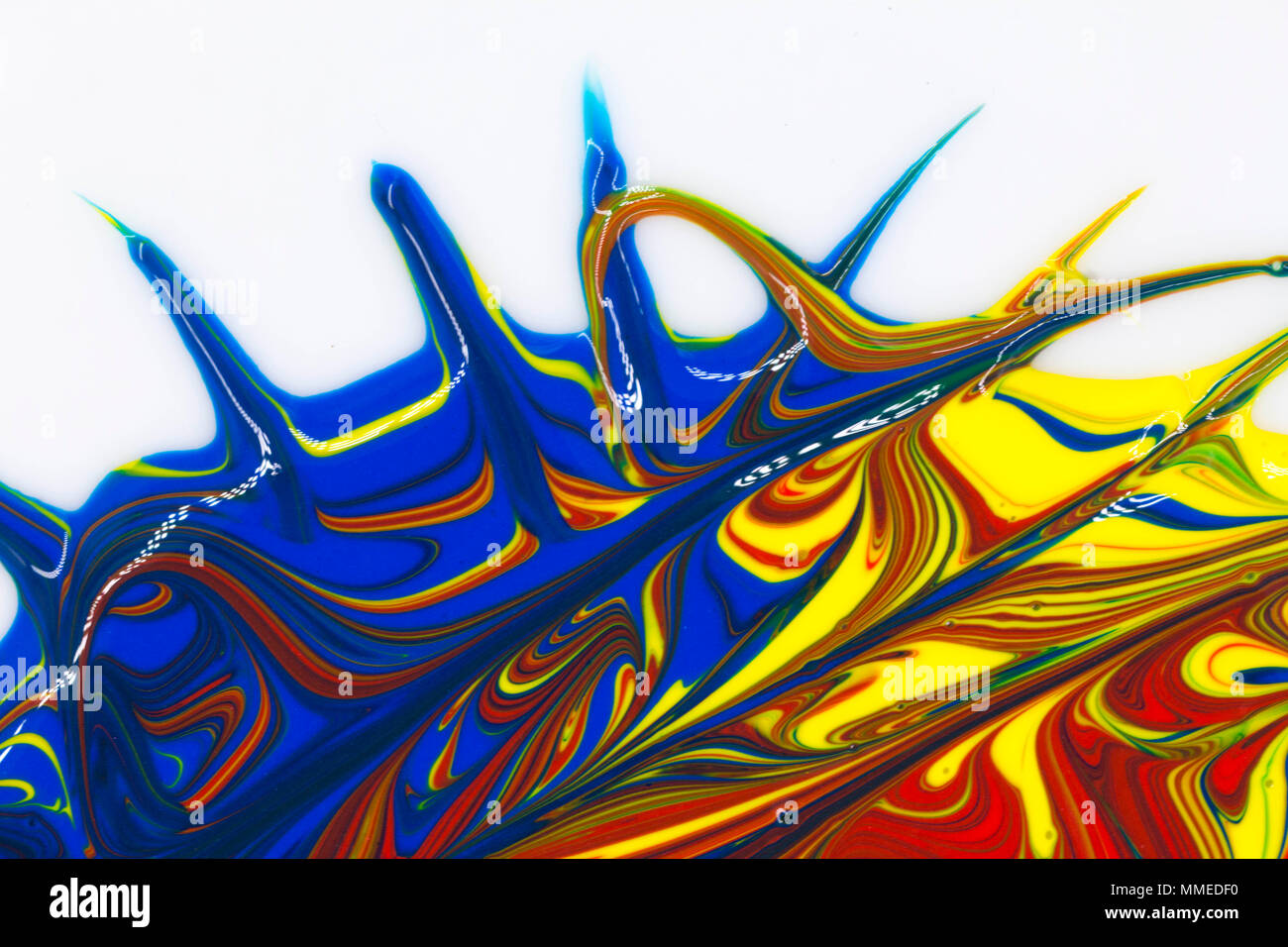 Abstract background of red yellow and blue paint splat / swirl Stock ...