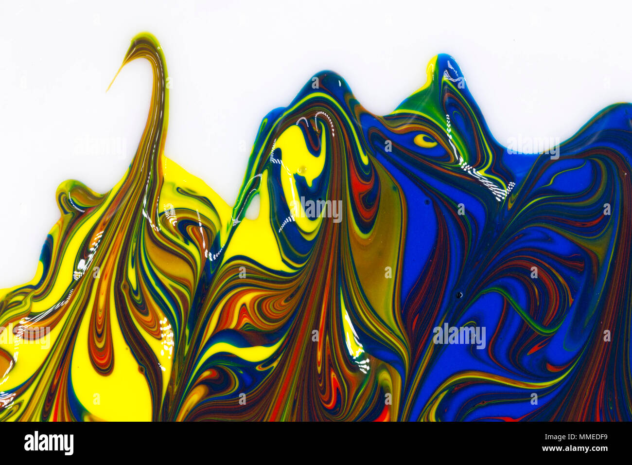 Abstract background of red yellow and blue paint splat / swirl Stock ...