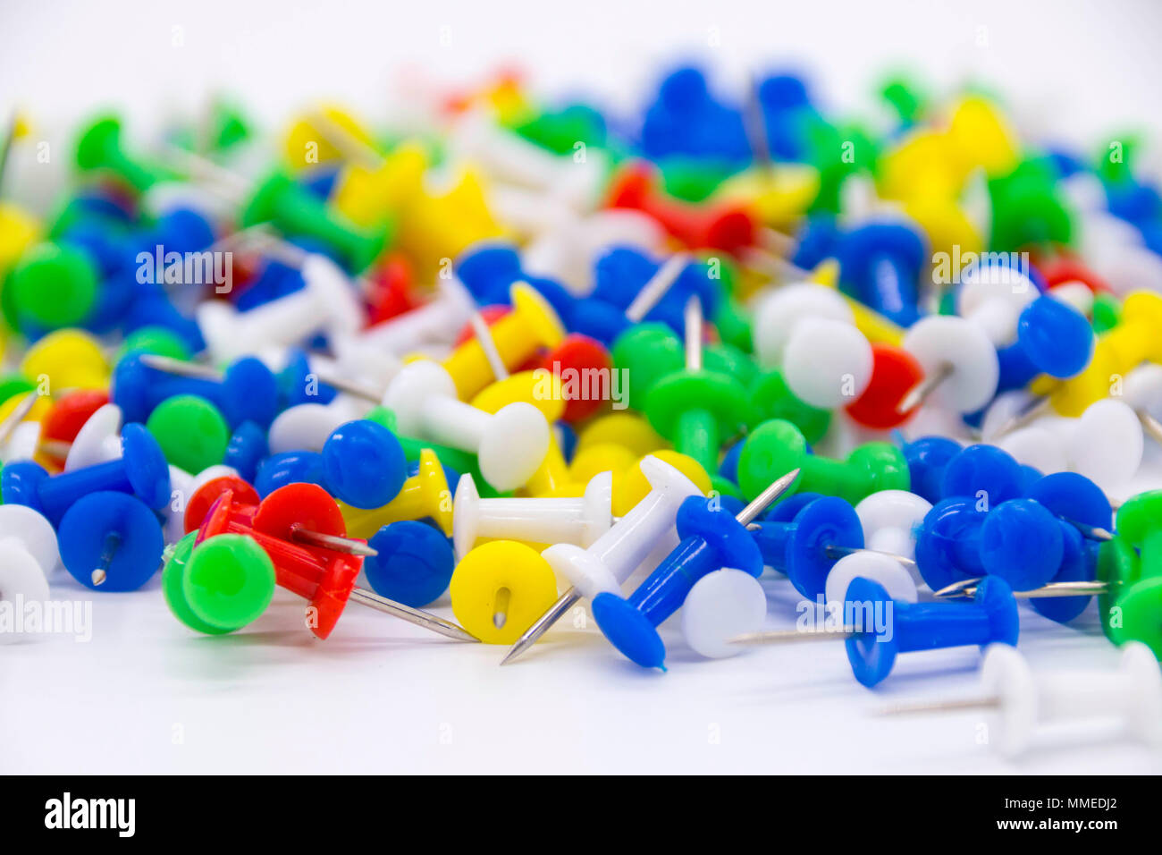 Pile of plastic notice board push pins on a white background Stock ...