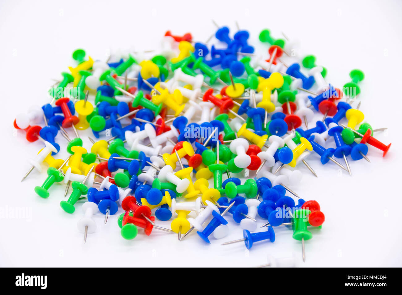 Pile of plastic notice board push pins on a white background Stock ...