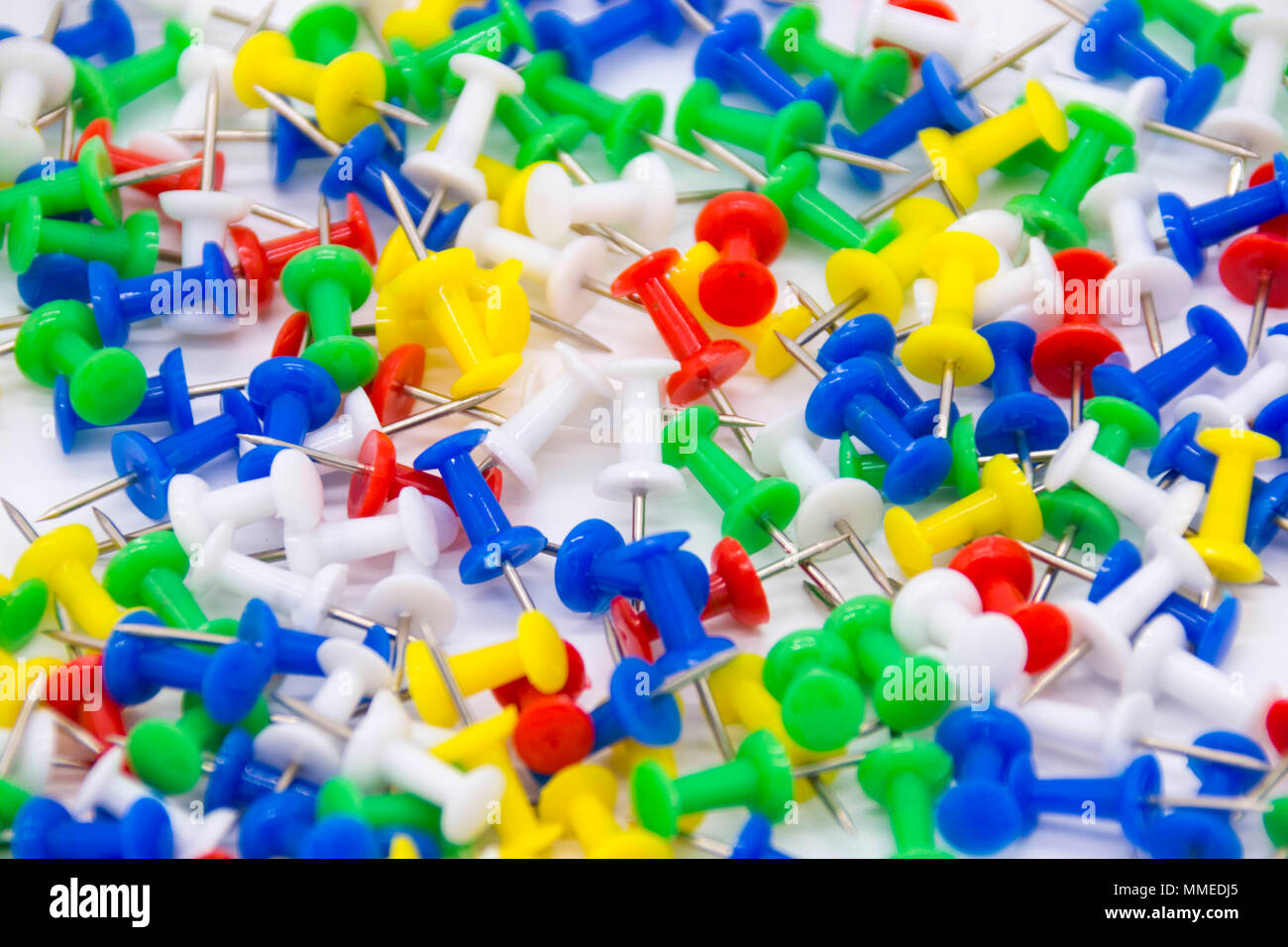 Pile of plastic notice board push pins on a white background Stock ...
