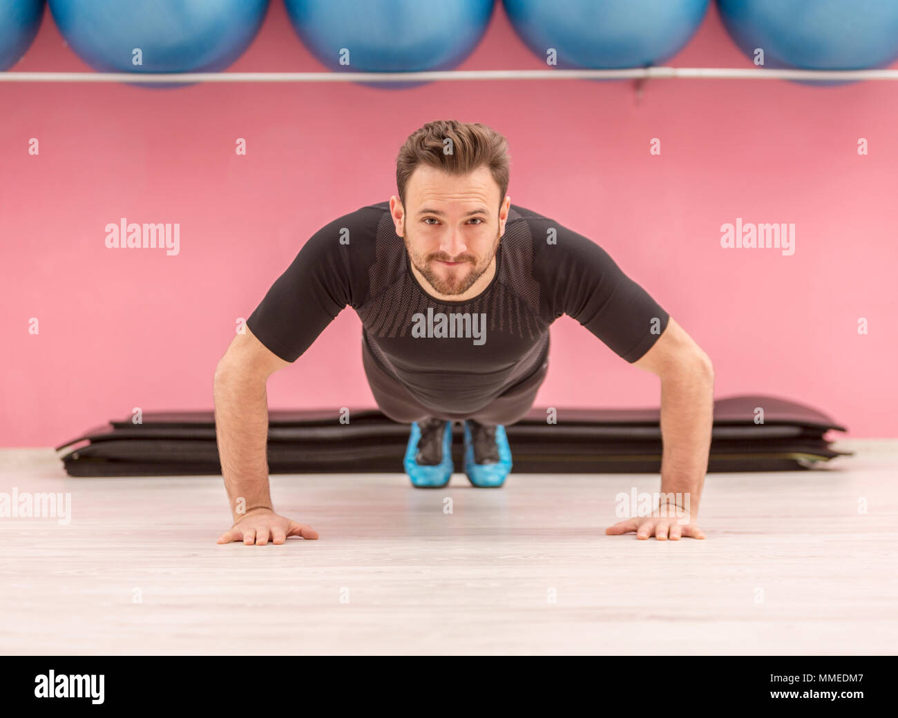 Gym man frontal hi-res stock photography and images - Alamy