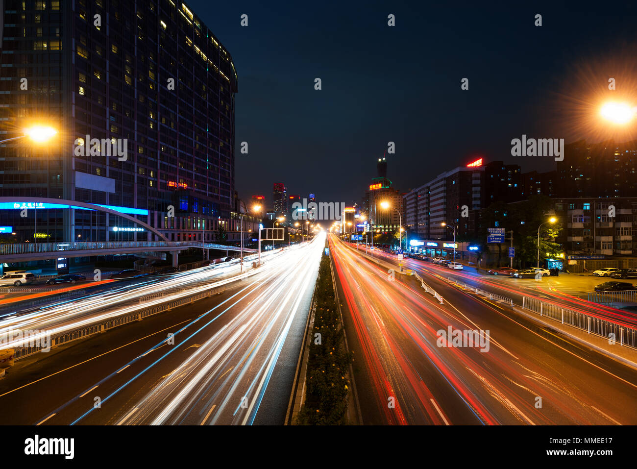 Light trails on the street at Beijing Central Business district at ...