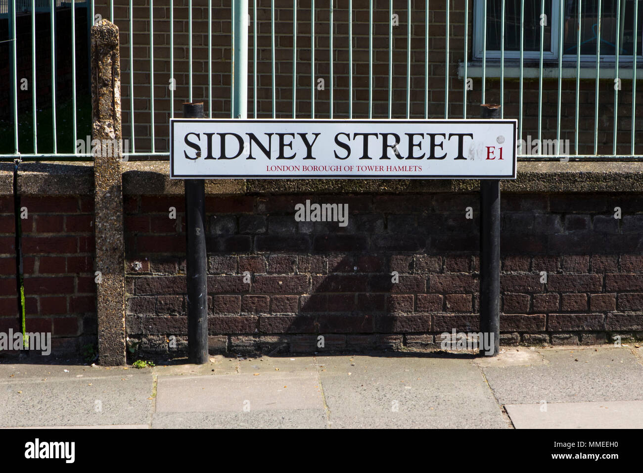 A street sign for Sidney Street in the East End of London, UK. The ...