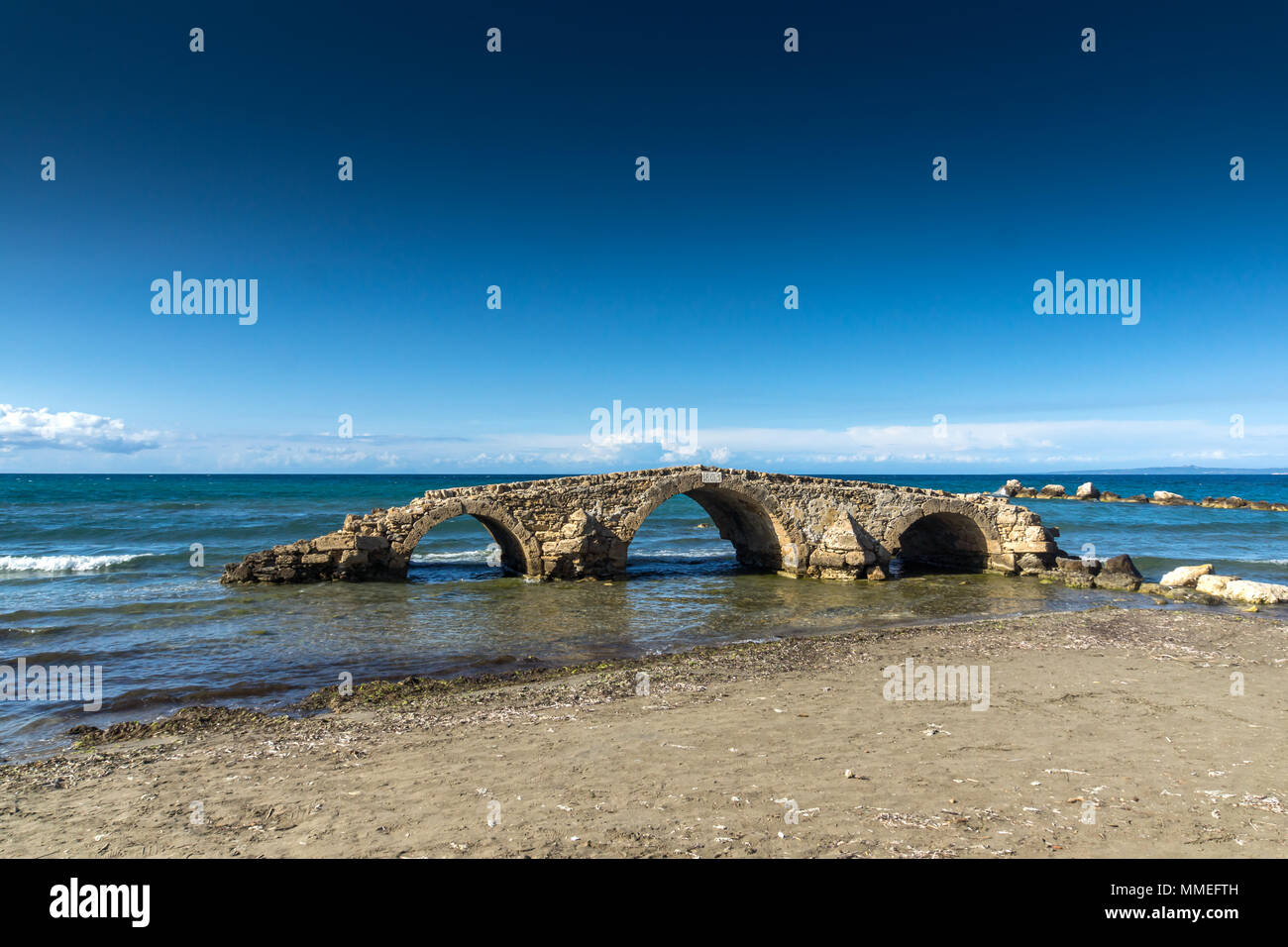 Medieval bridge in the water at Argassi beach, Zakynthos island, Greece ...