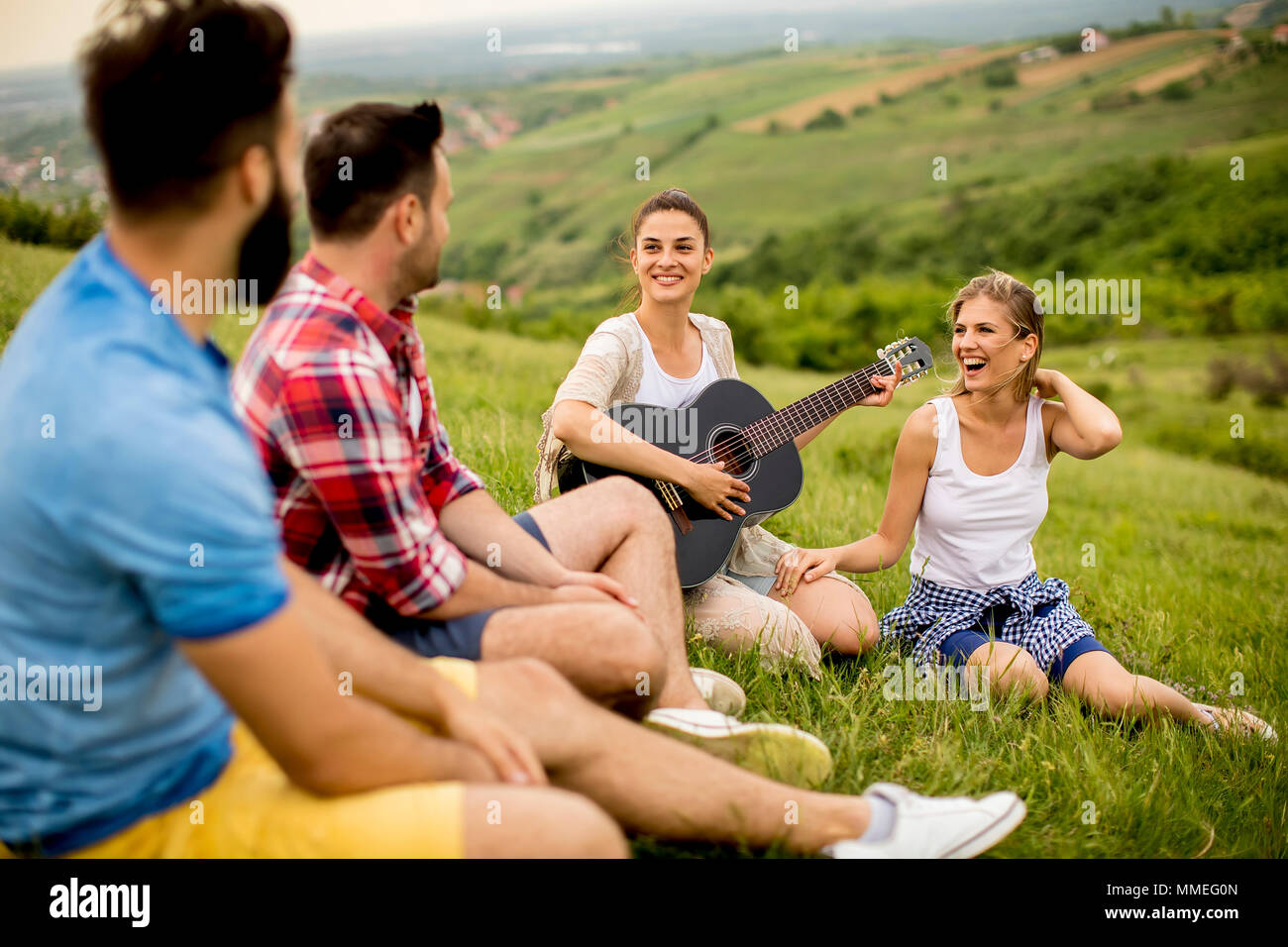 Group od young people having fun on a trip in nature on mountain Stock ...