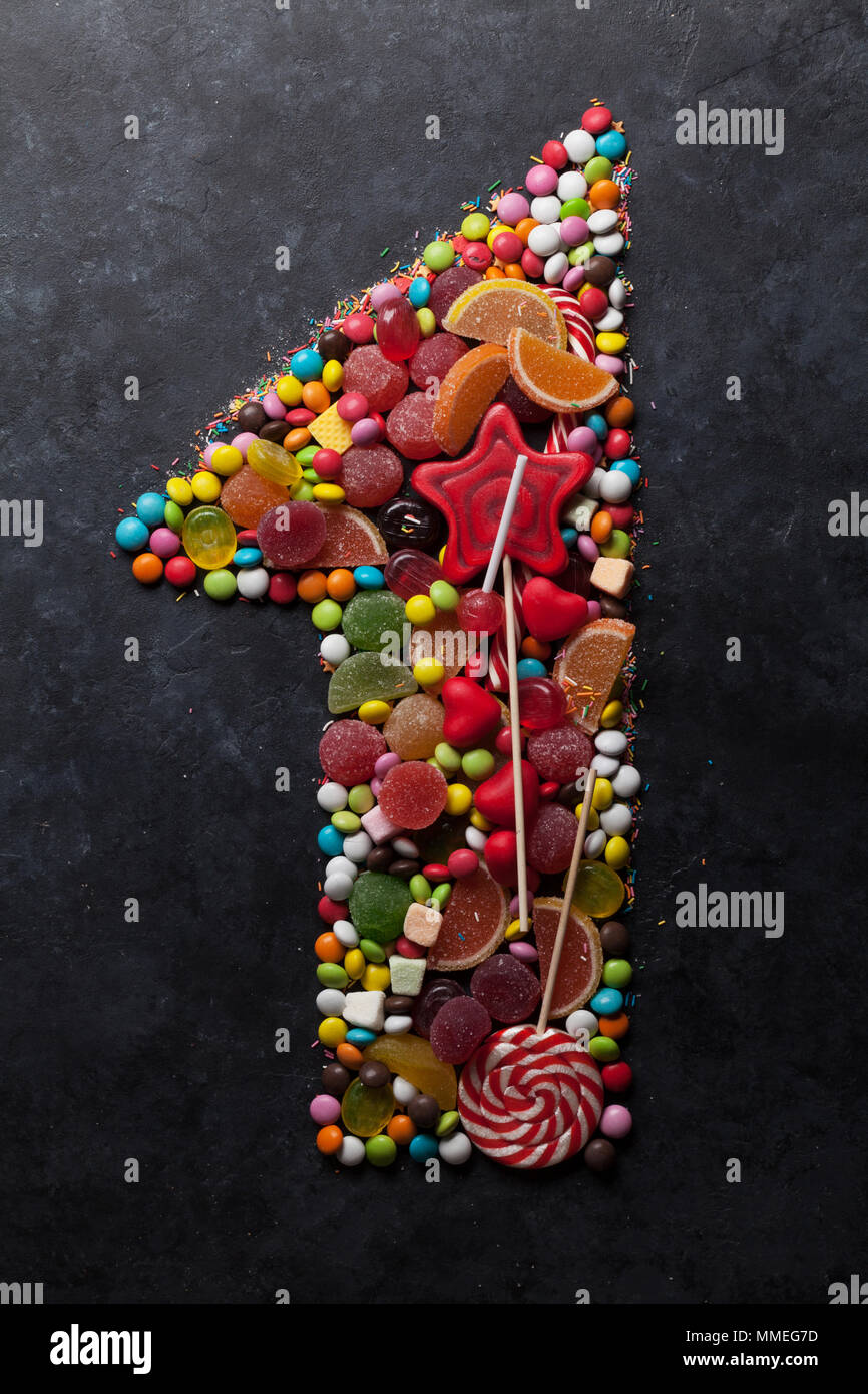 Number one made from sweet candies on dark background. Greeting card ...