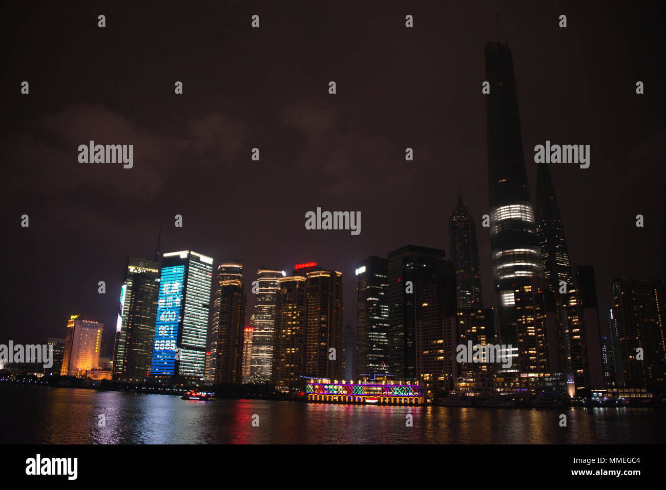 The vibrant city of Shanghai at night taken from a river boat Stock ...