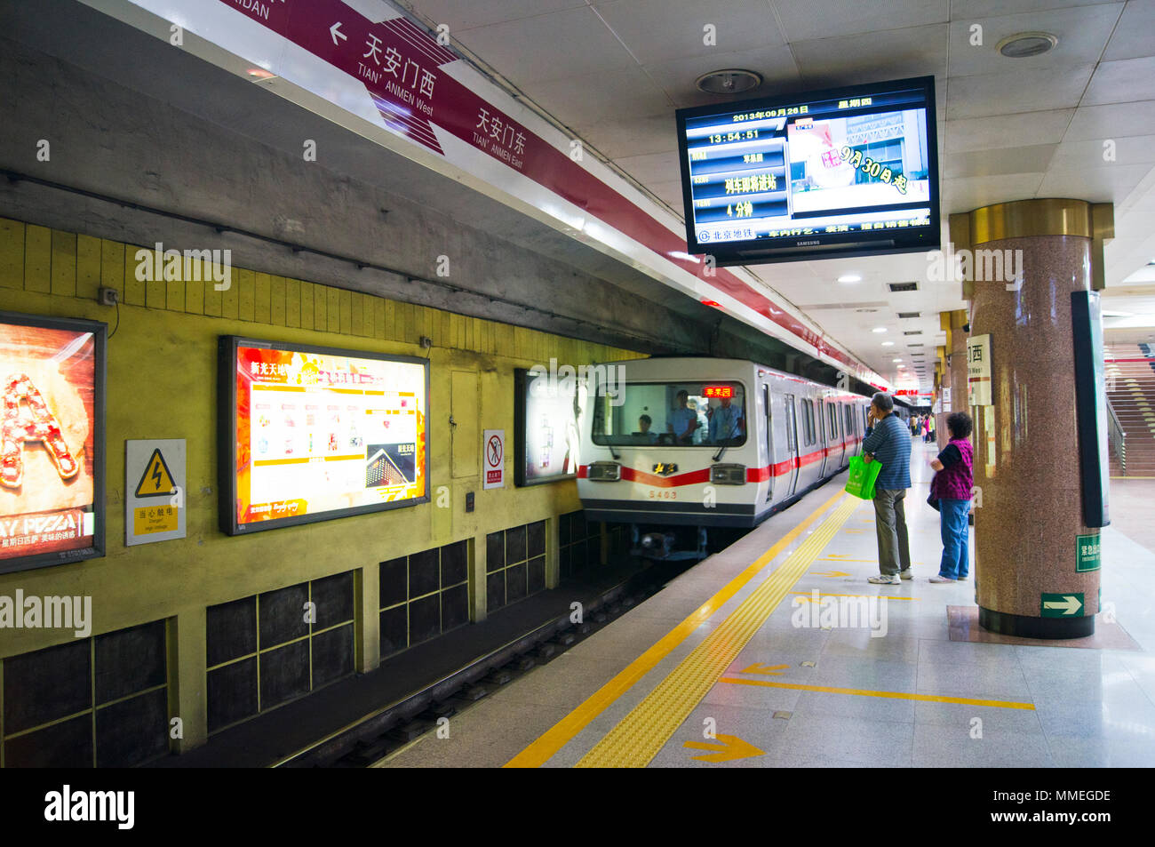 Beijing subway train arriving in Tiananmen West station Stock Photo - Alamy