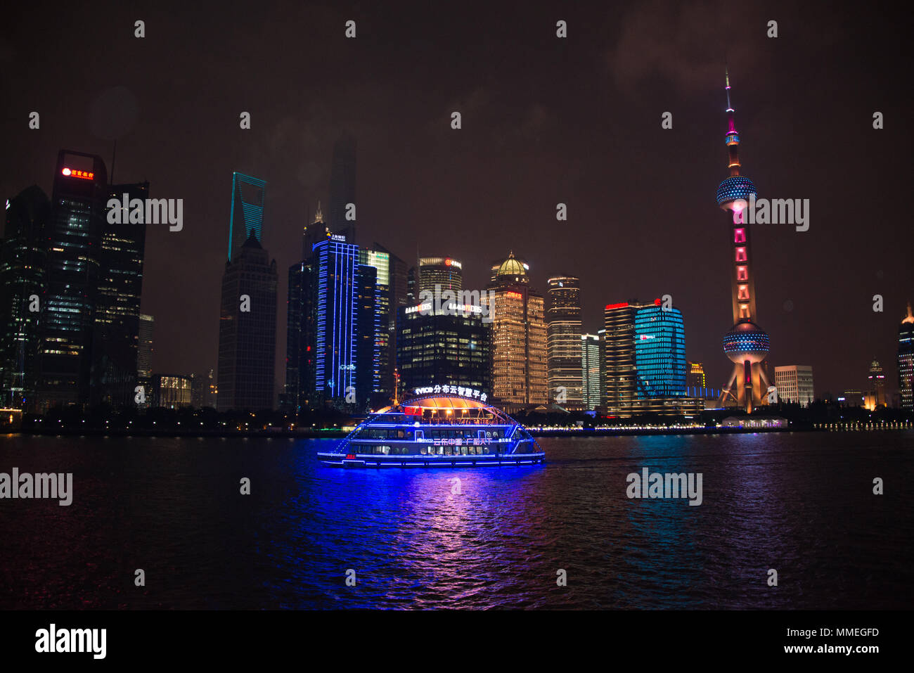 The vibrant city of Shanghai at night taken from a river boat Stock ...