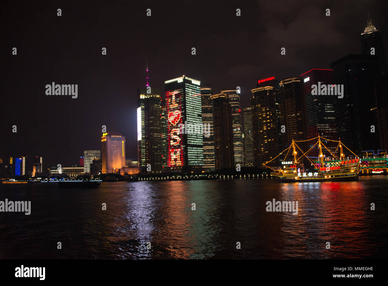 The vibrant city of Shanghai at night taken from a river boat Stock ...