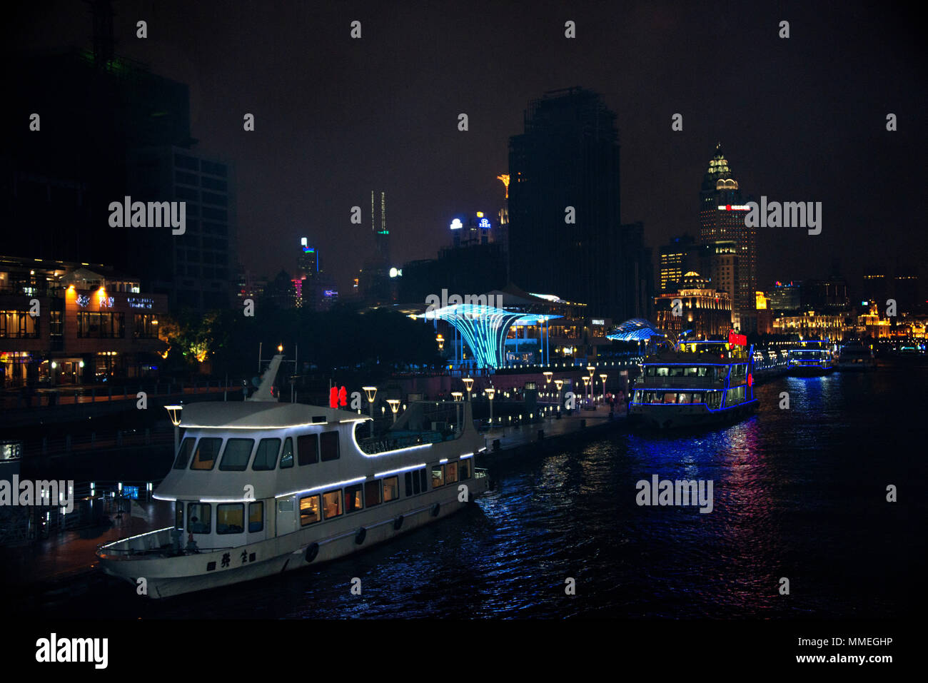 The vibrant city of Shanghai at night taken from a river boat Stock ...