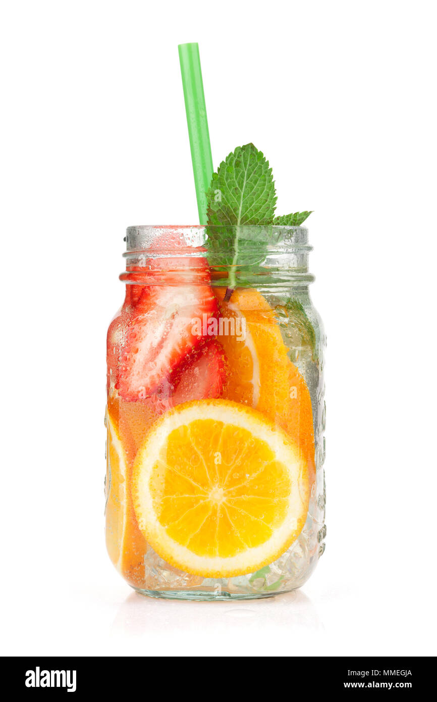 Fresh lemonade jar with summer fruits and berries. Isolated on white ...