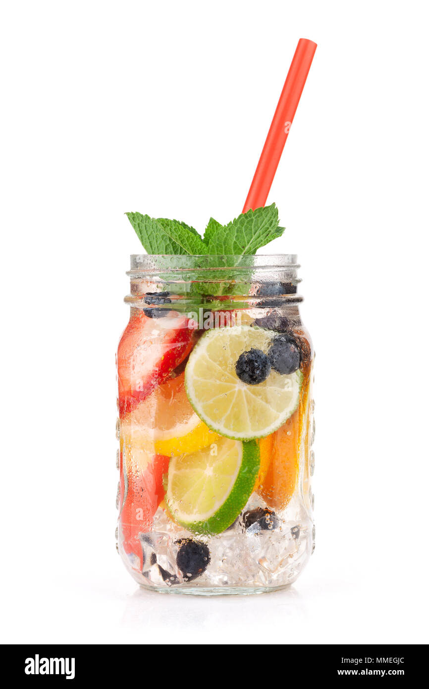 Fresh lemonade jar with summer fruits and berries. Isolated on white ...