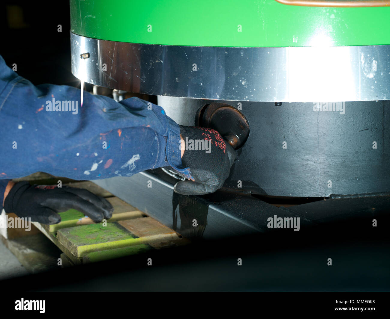 Removing and replacing the hand hole and gasket on a boiler Stock Photo ...