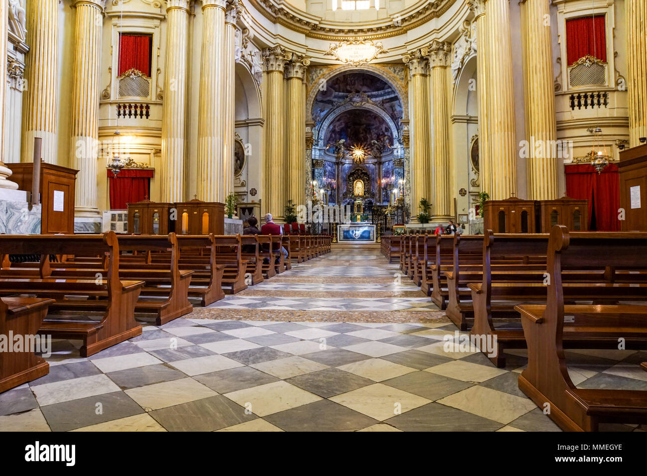 interior of a church with people who pray and approach God Stock Photo ...