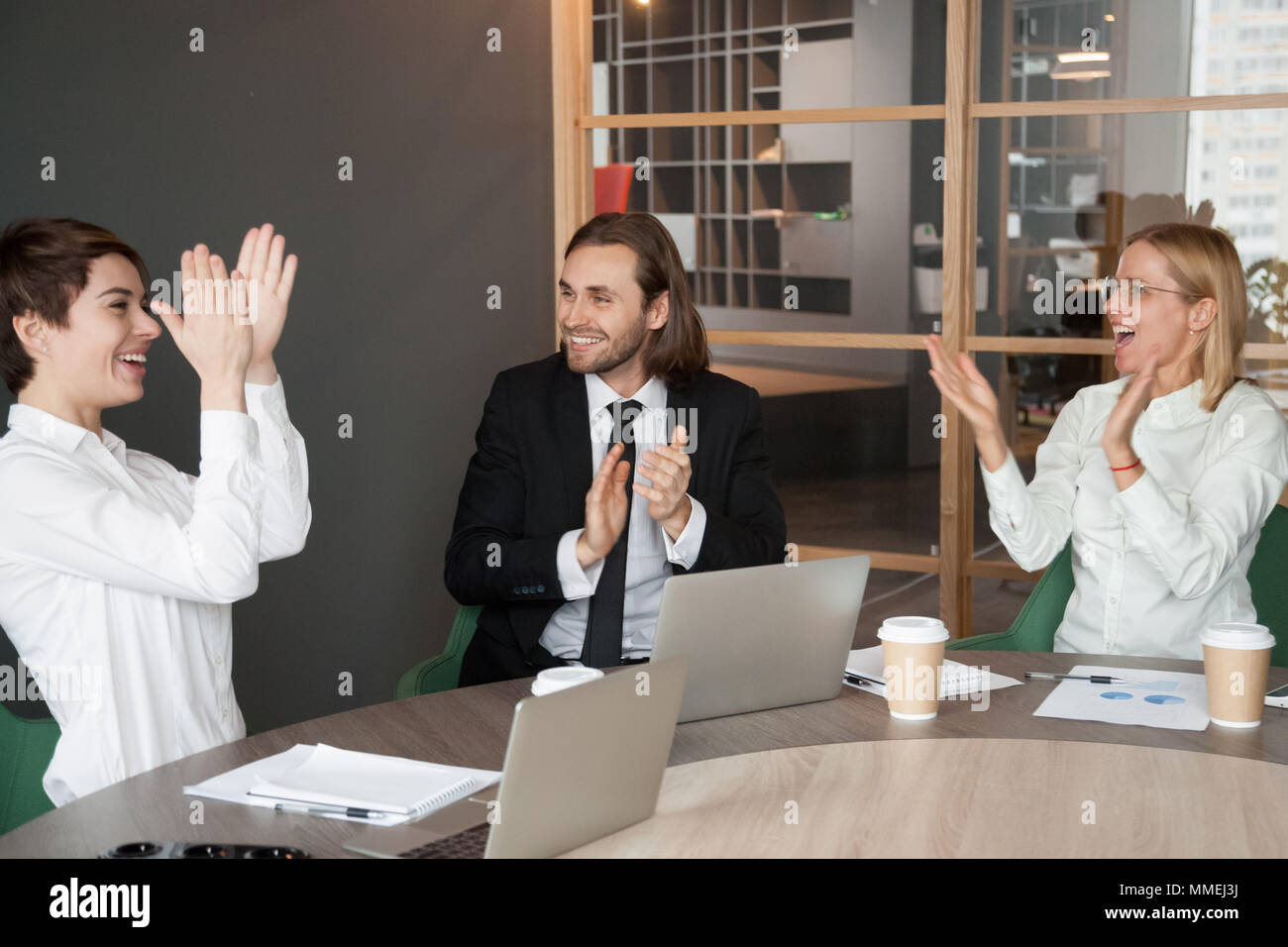 Applause colleagues woman successful hi-res stock photography and ...