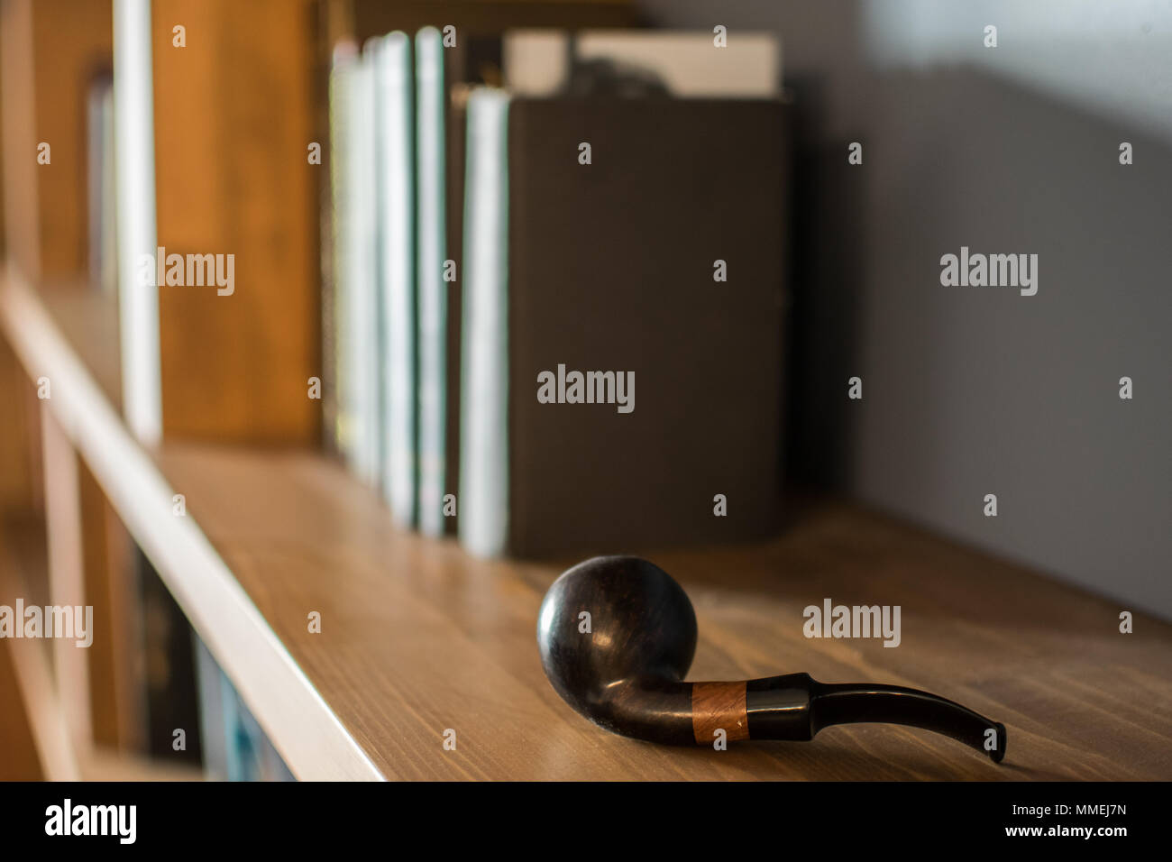Reading a book and smoking pipe hi-res stock photography and images - Alamy