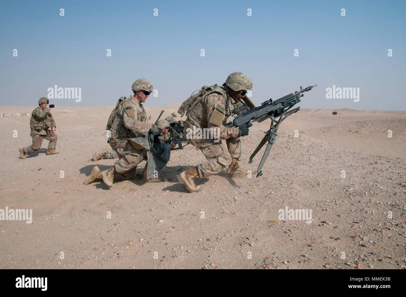Spc. Douglas Lawyer (carrying machine gun), an infantryman with C ...