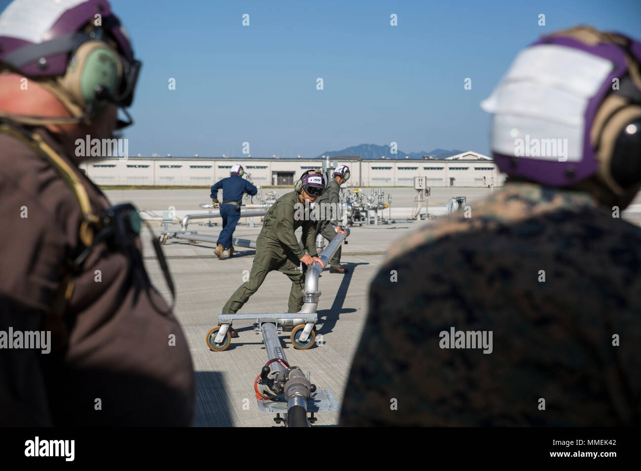 U.S. Marines and Master Labor Contractors with the Logistics Department ...
