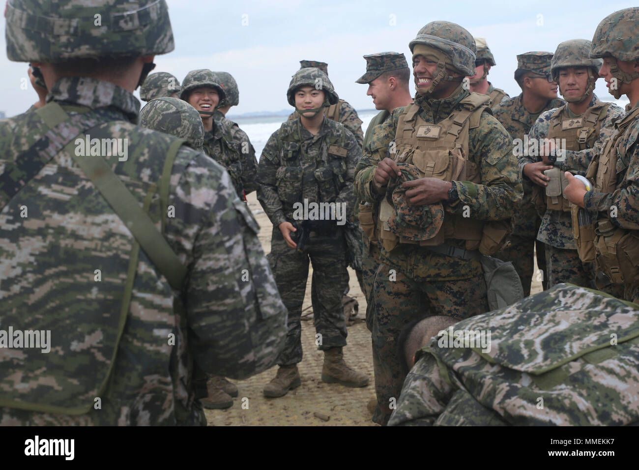 U.S. Marine Lance Cpl. Wilber Valencia, a water purification specialist ...