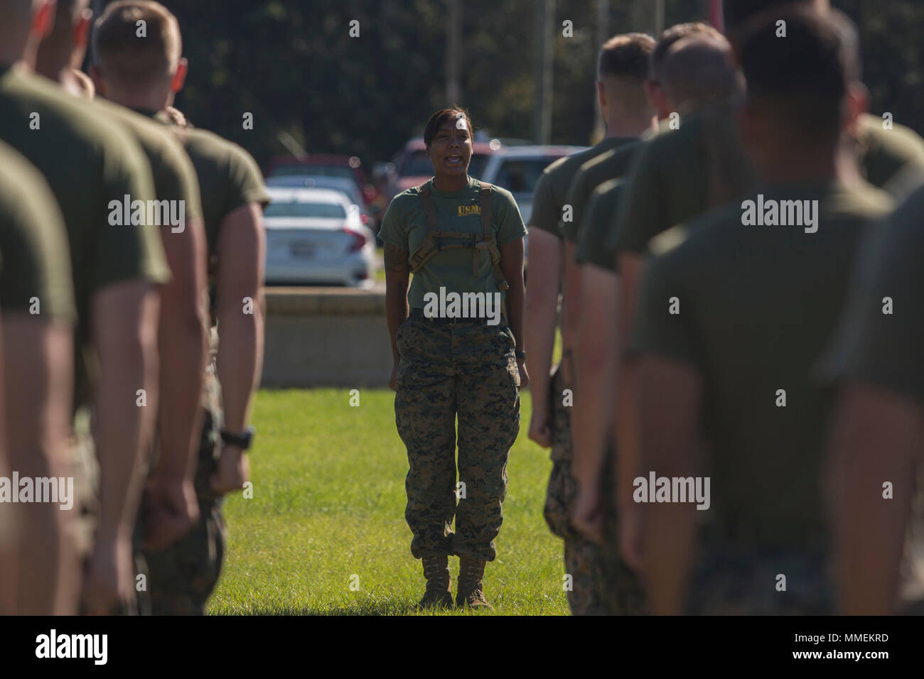 Marines stand in formation during a physical training session aboard ...